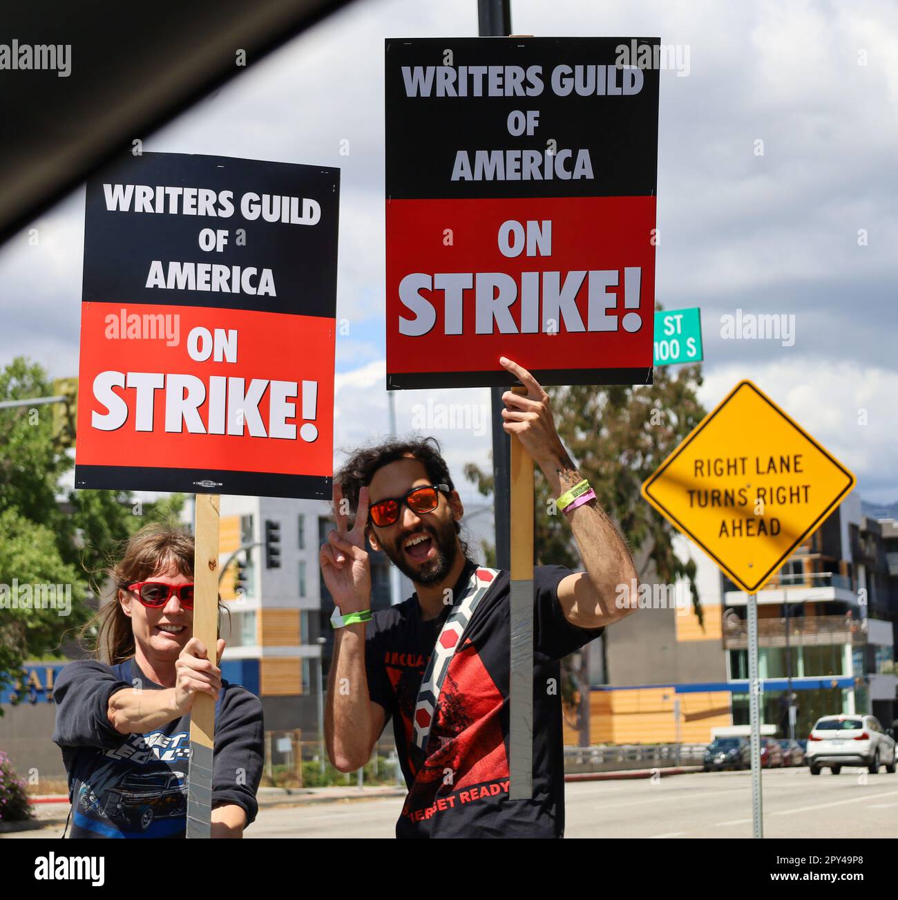Burbank, California, USA. 2nd May, 2023. Protestors cheerily walk with ...