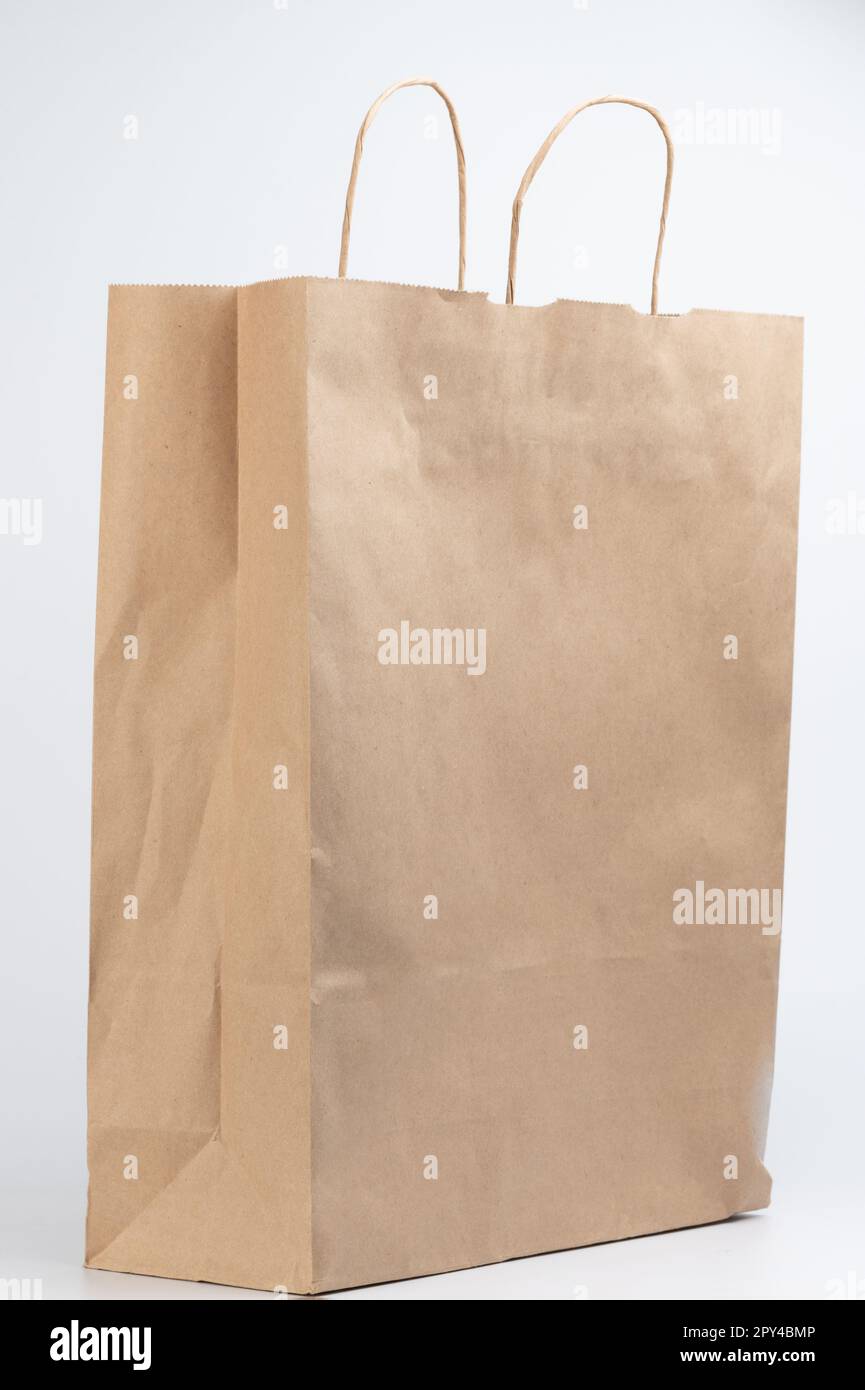 One clean recycled paper bag isolated on white studio background Stock ...
