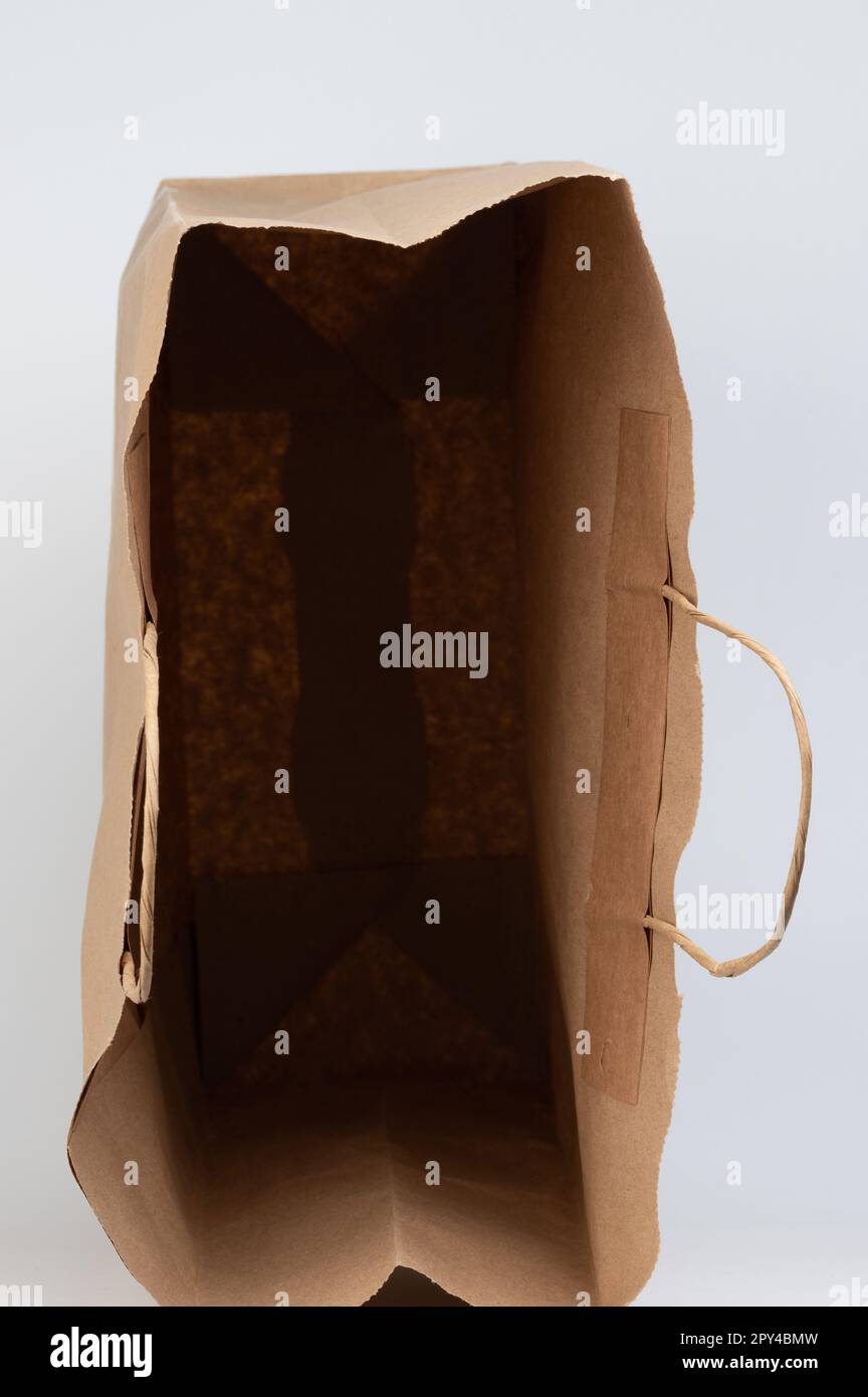 Bottom of open recycle paper bag isolated on white studio background ...