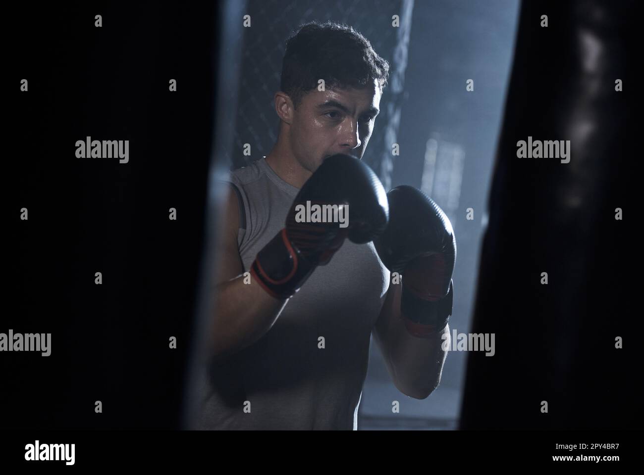 The right form reaps the full benefits. a young man practicing his ...