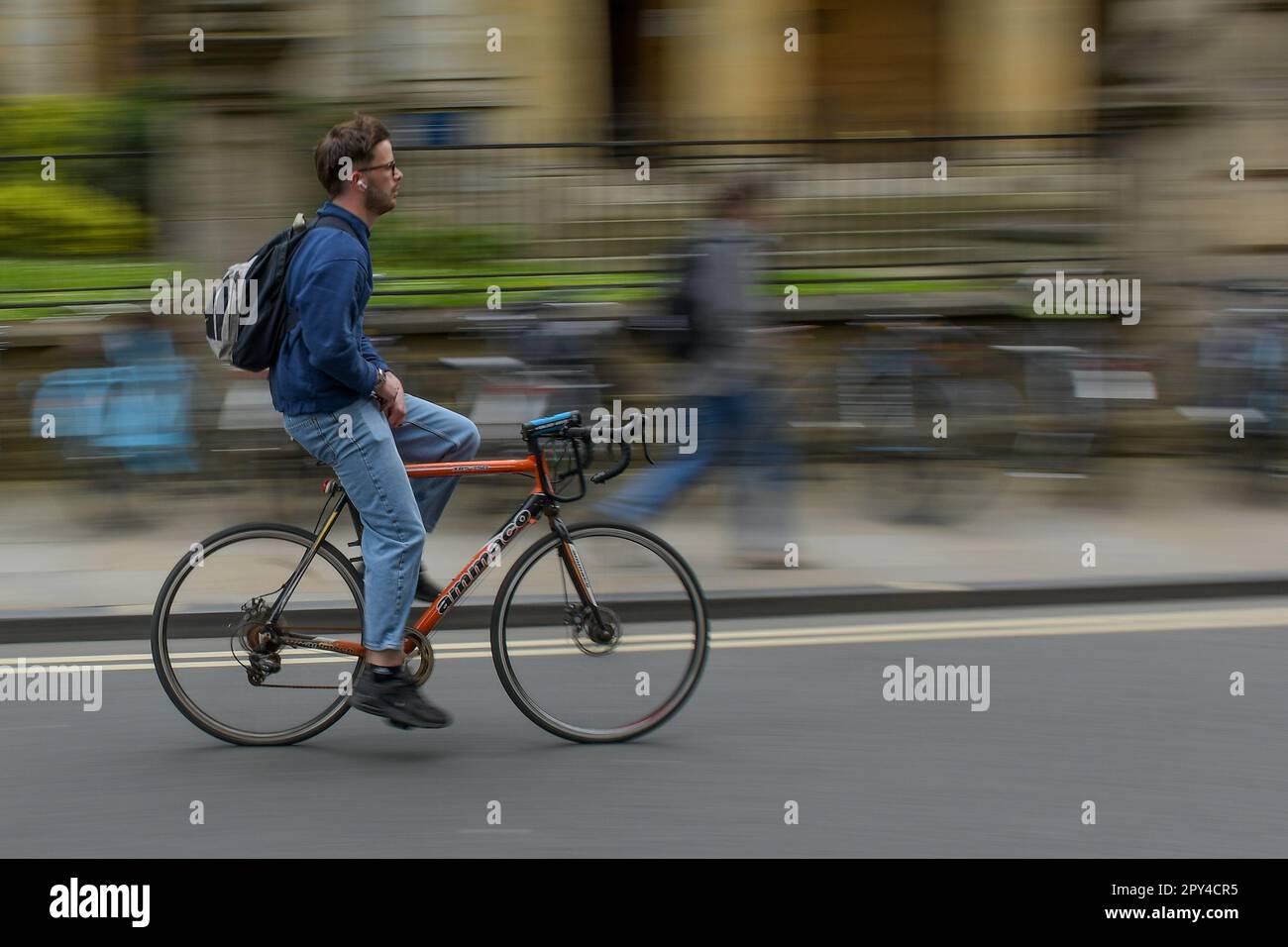 Cyclist with no helmet hi-res stock photography and images - Alamy