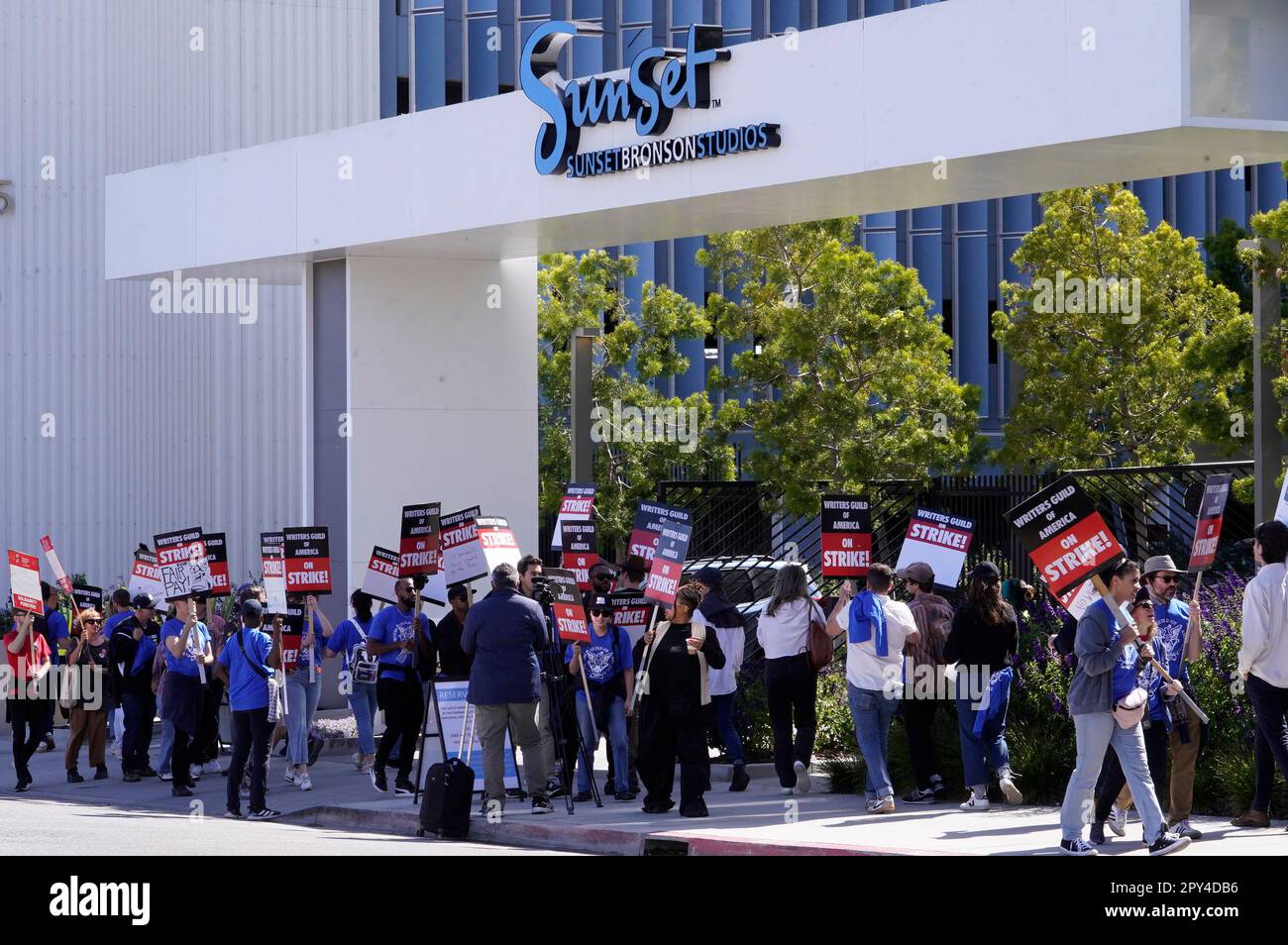 Members of the Writers Guild of America picket outside the Sunset ...