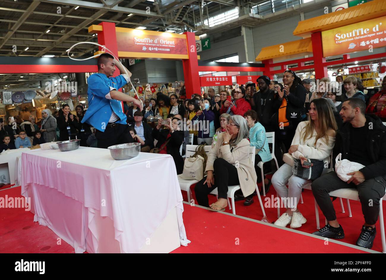 Paris, France. 2nd May, 2023. A chef demonstrates noodle-stretching ...