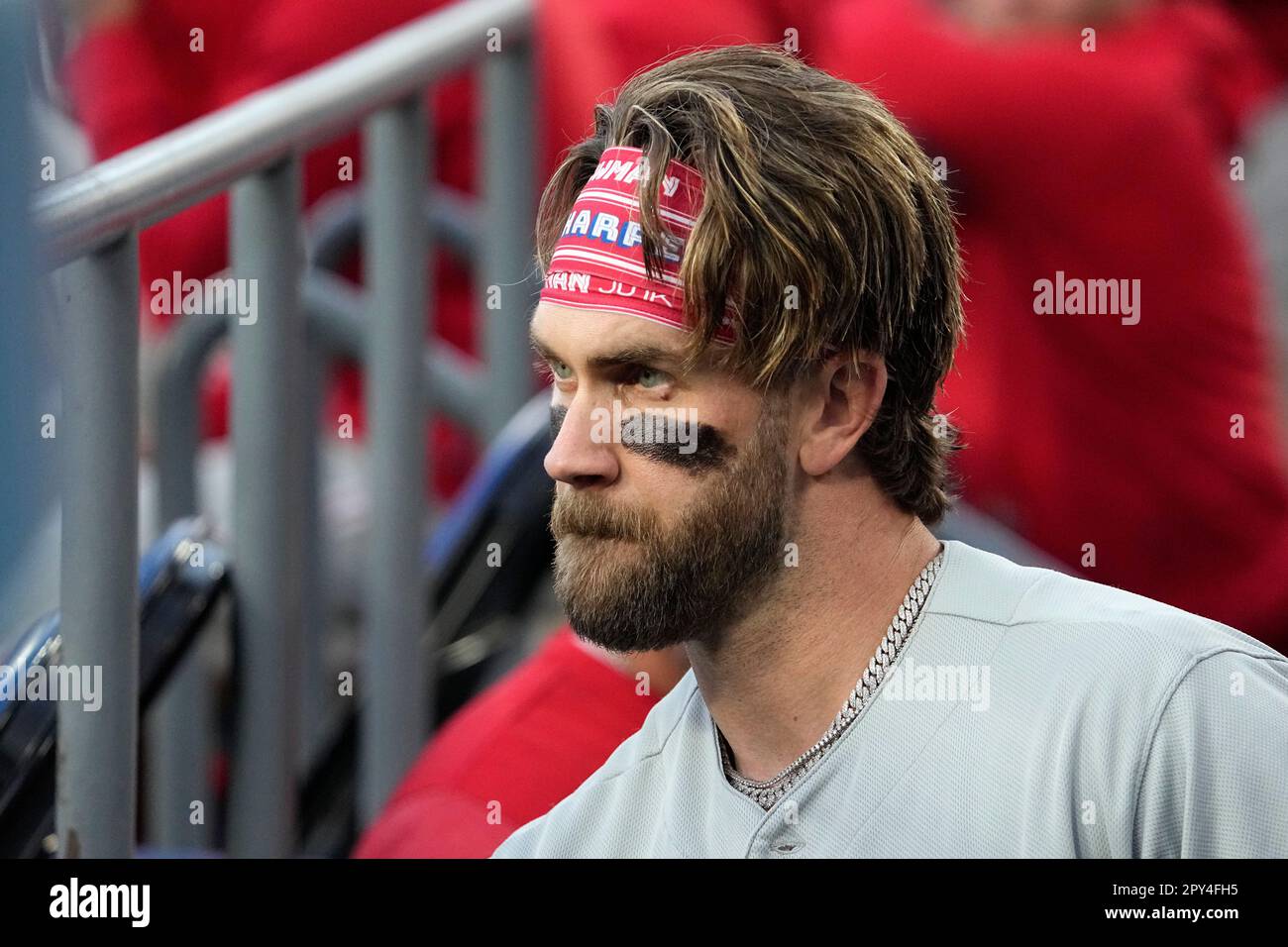 Philadelphia Phillies' Bryce Harper stands in the dugout prior to a ...