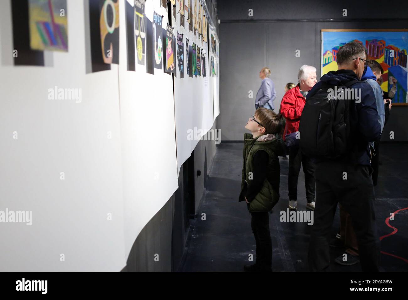 Odessa, Ukraine. 02nd May, 2023. A boy is seen looking at the artworks ...