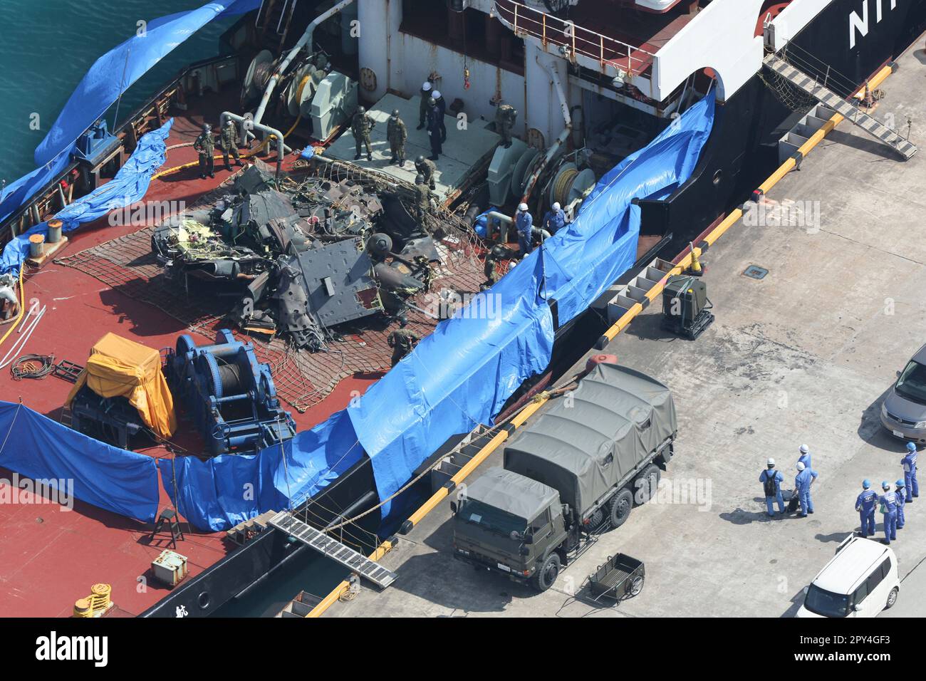 An aerial photo shows the wreckage of a sunken helicopter of the Japan ...