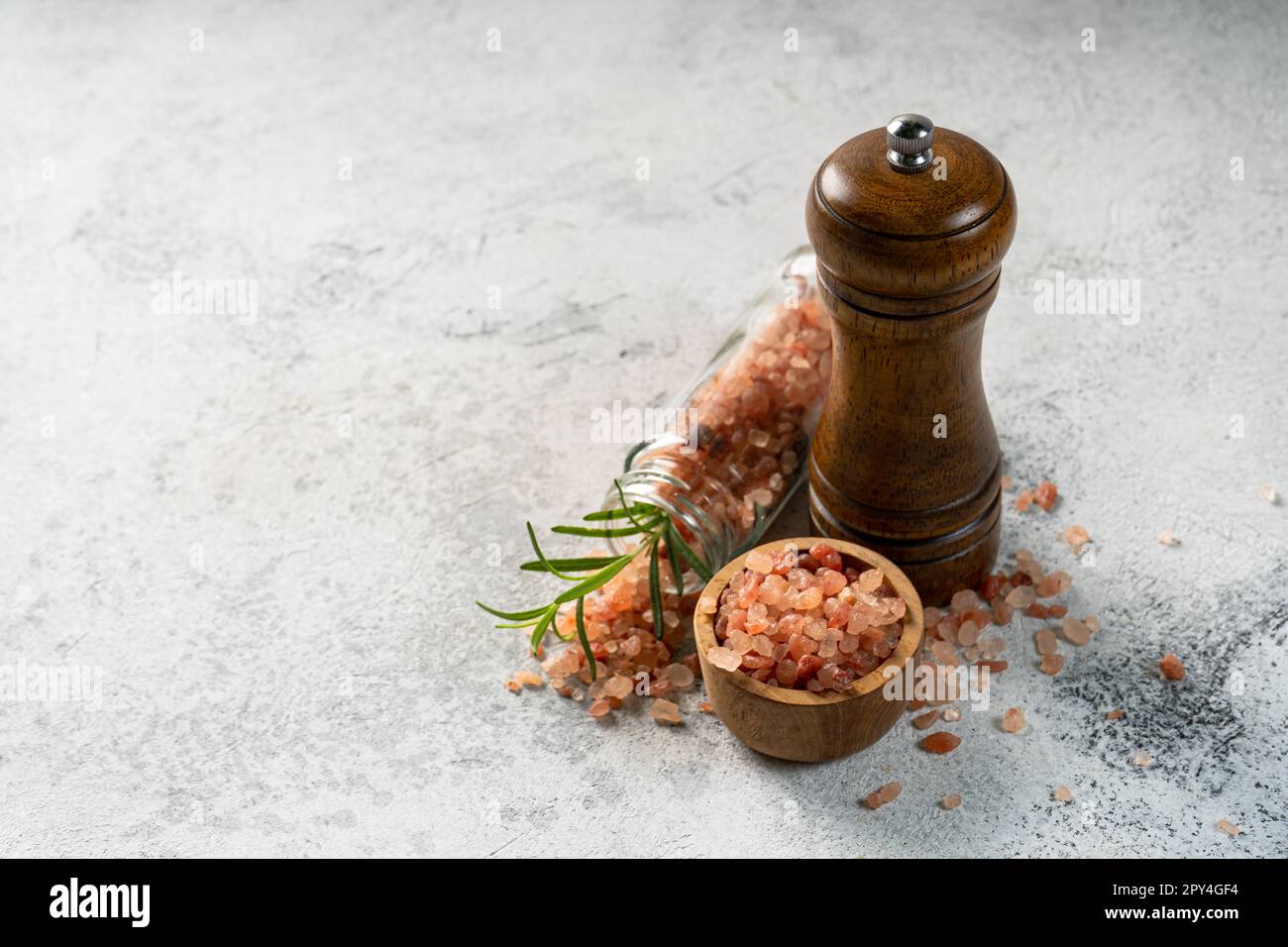 Himalayan pink salt is herb seasoning isolated on white abstract ...