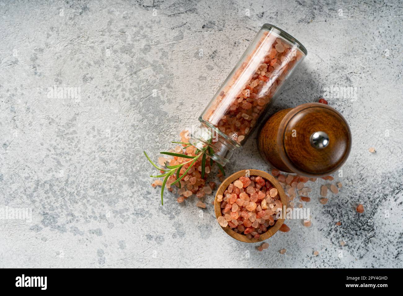 Himalayan pink salt is herb seasoning isolated on white abstract ...