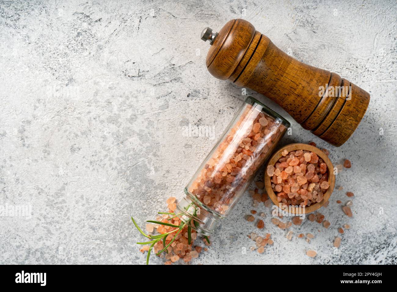 Himalayan pink salt is herb seasoning isolated on white abstract ...