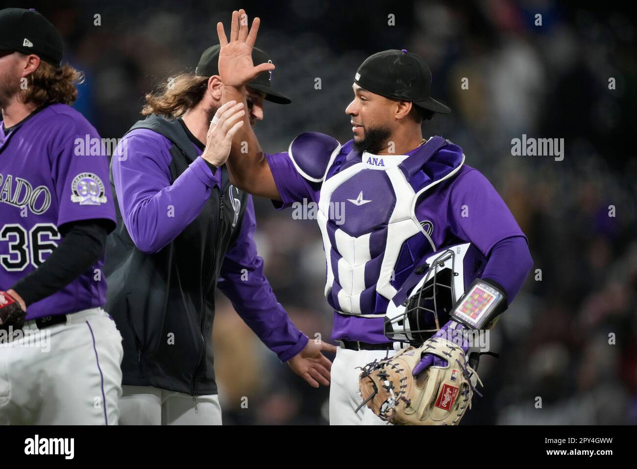 Colorado Rockies' Charlie Blackmon, left, congratulates catcher Elias ...