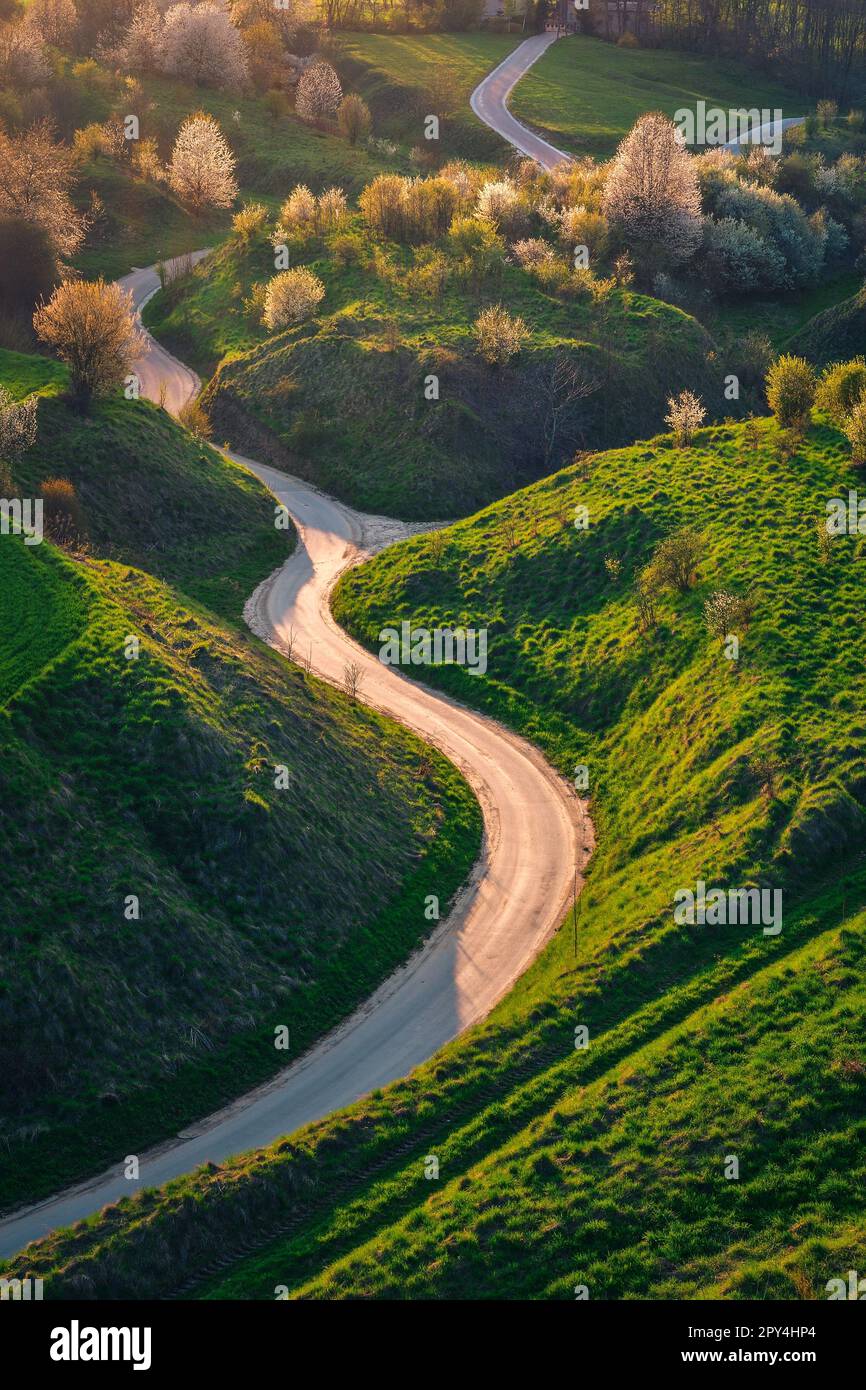 Beautiful green spring landscape in the Polish countryside. Winding ...