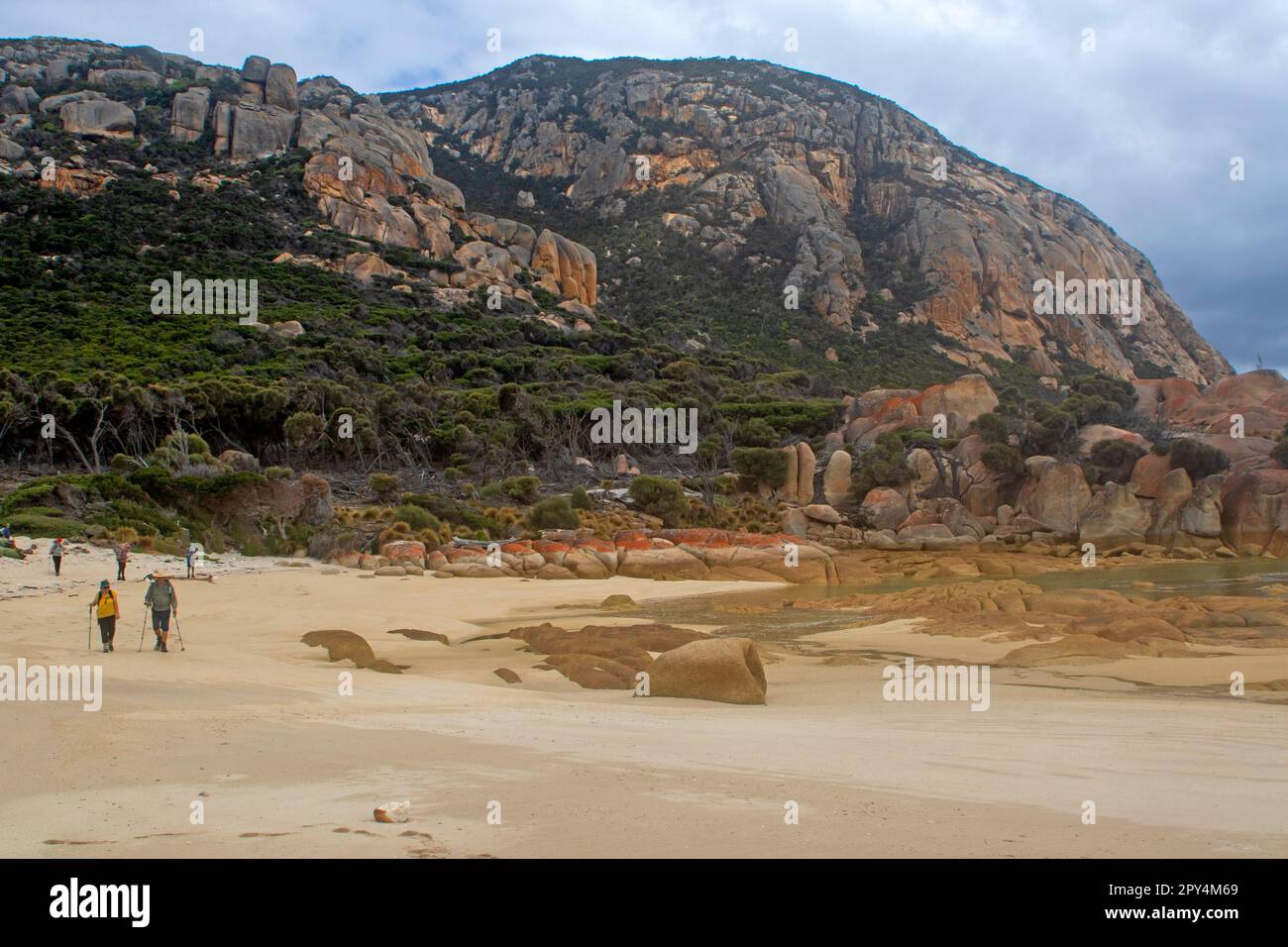 Hikers on the beach at The Dock, Flinders Island Stock Photo - Alamy