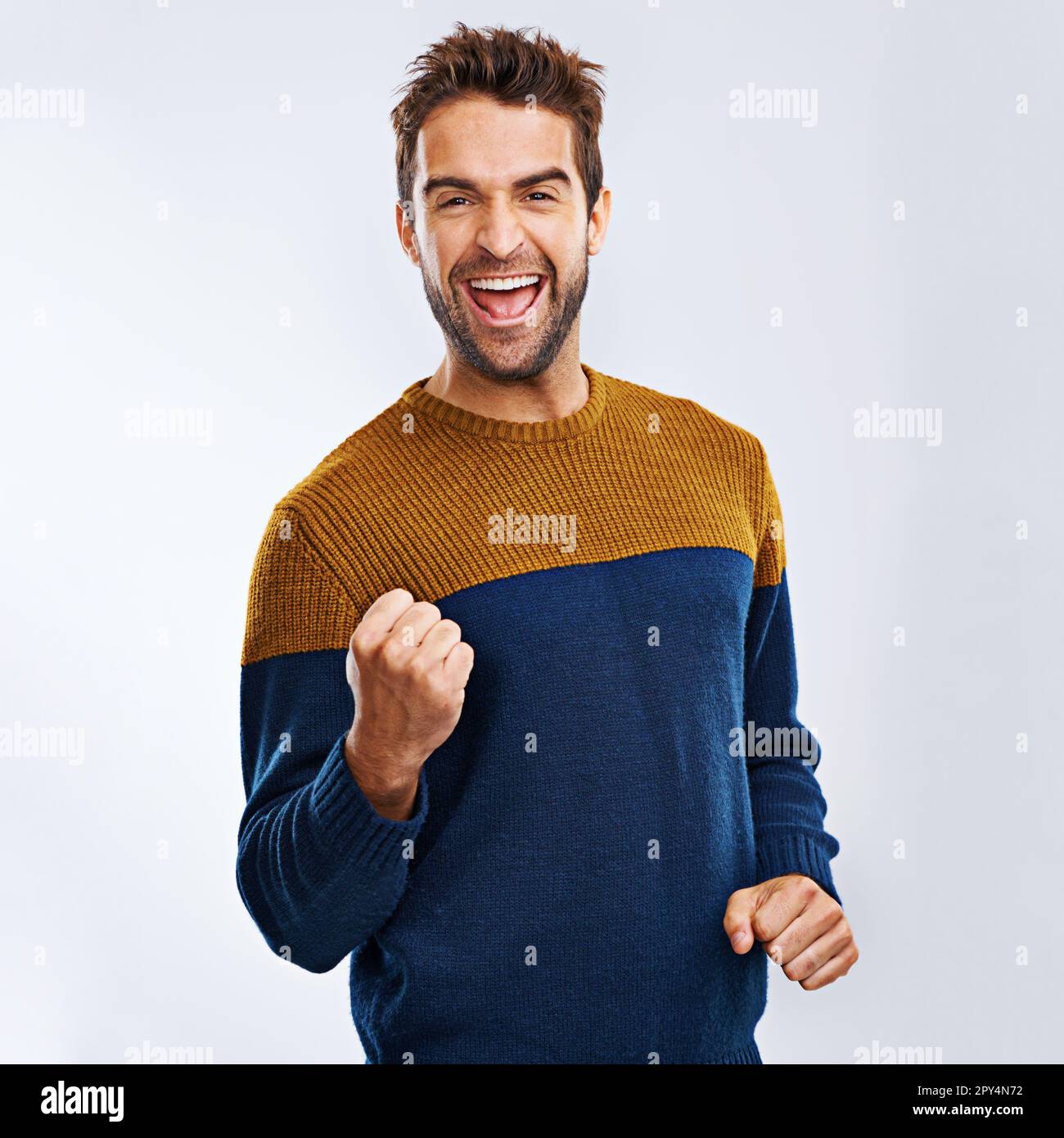 Portrait, cheering and man excited, celebration and winning with guy ...