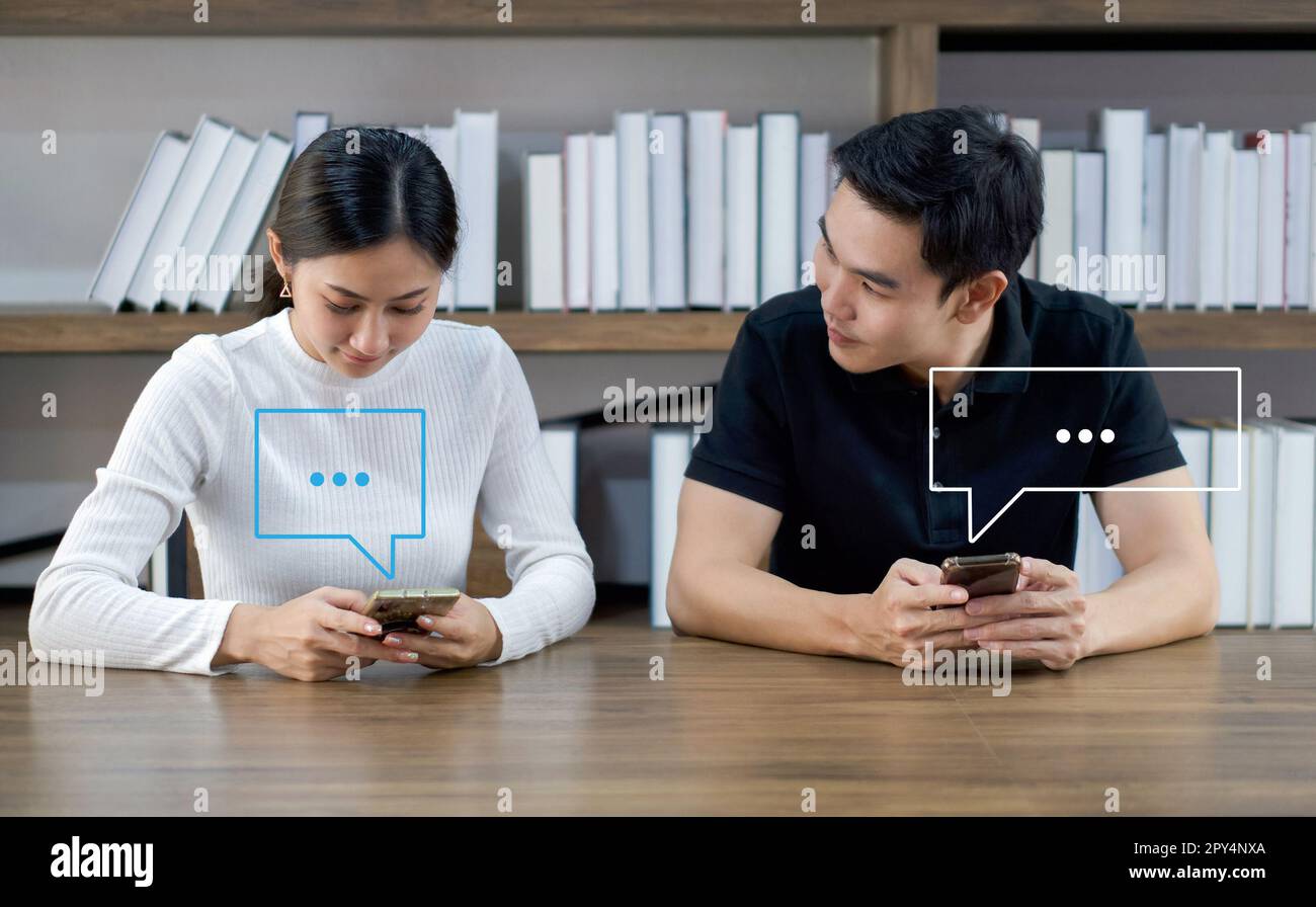 Young asian lovers using smartphone typing live chat chatting. Social ...