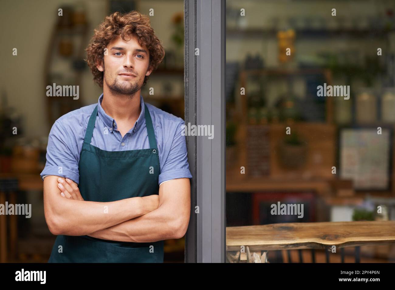 Door, arms crossed and thinking with man at cafe restaurant for small ...