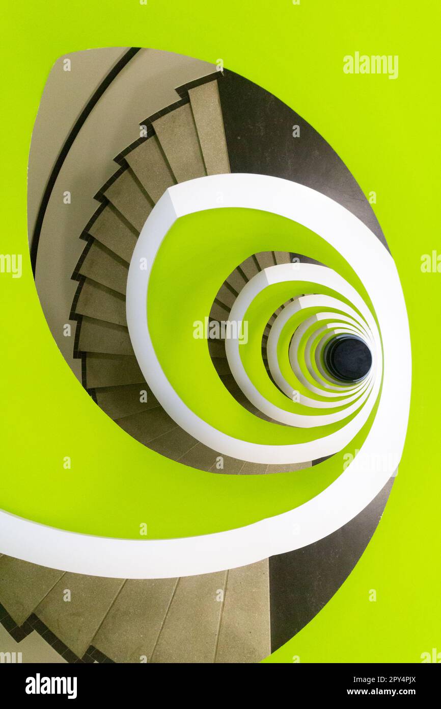 Spiral staircase with green color forming a beautiful shell pattern ...