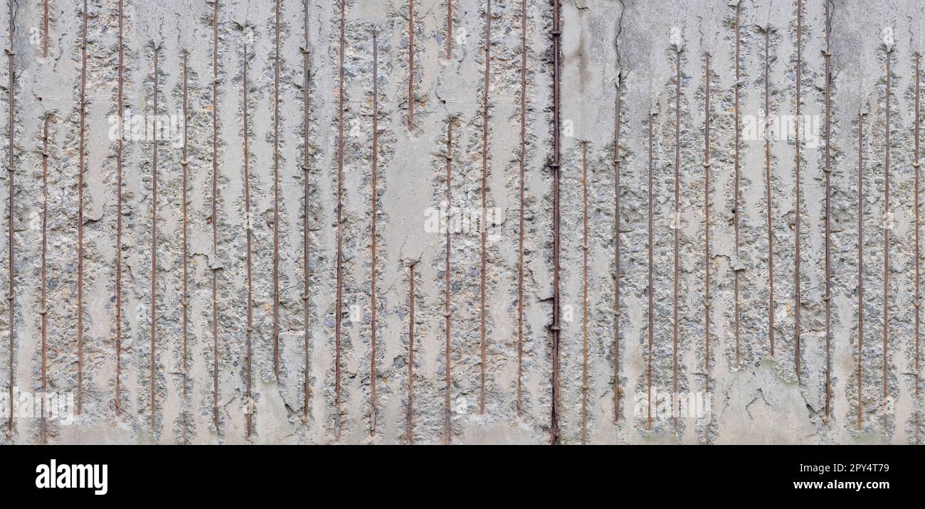 damaged concrete wall with rusty metal rebar Stock Photo - Alamy