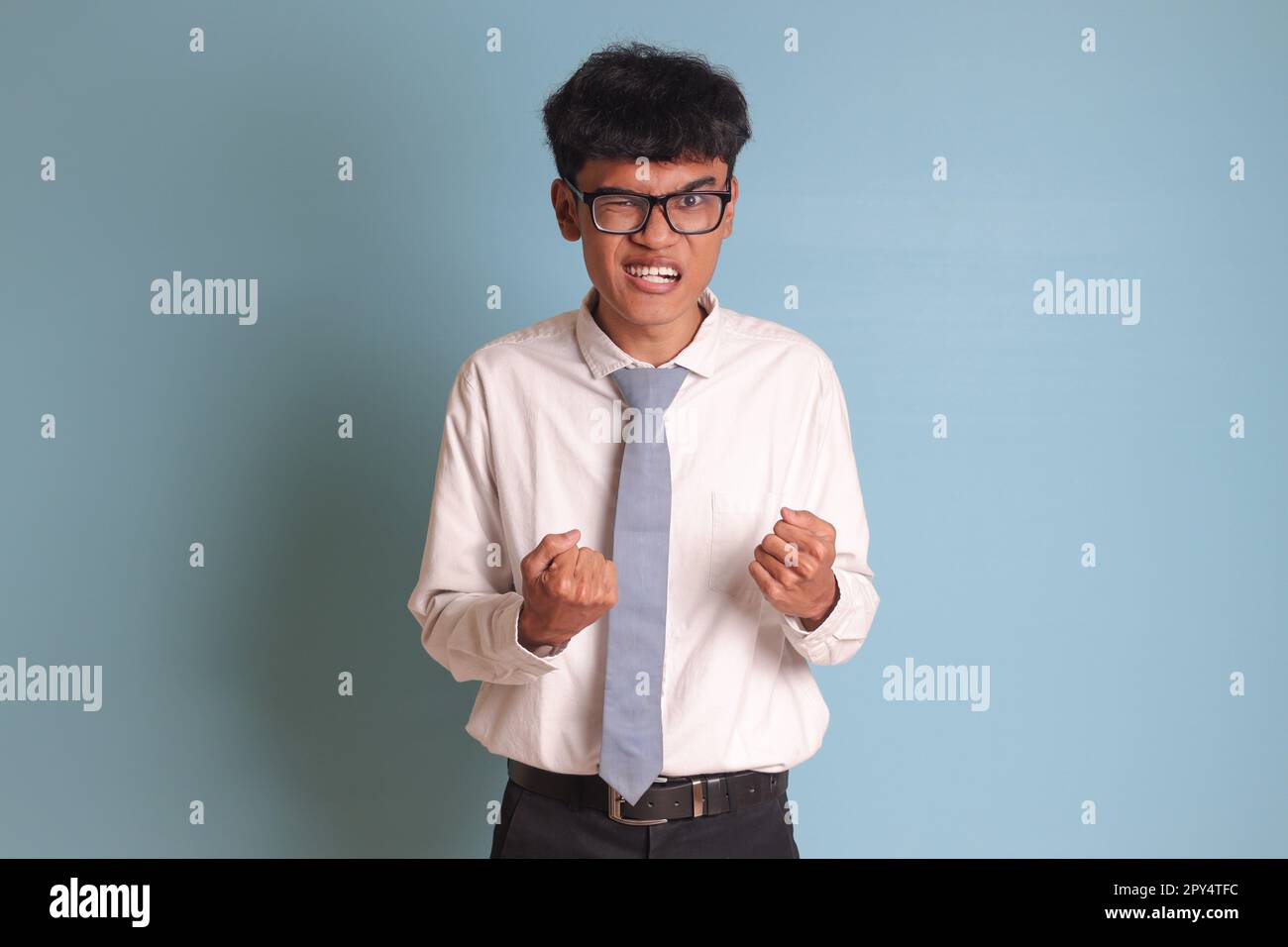 Indonesian senior high school student wearing white shirt uniform with ...