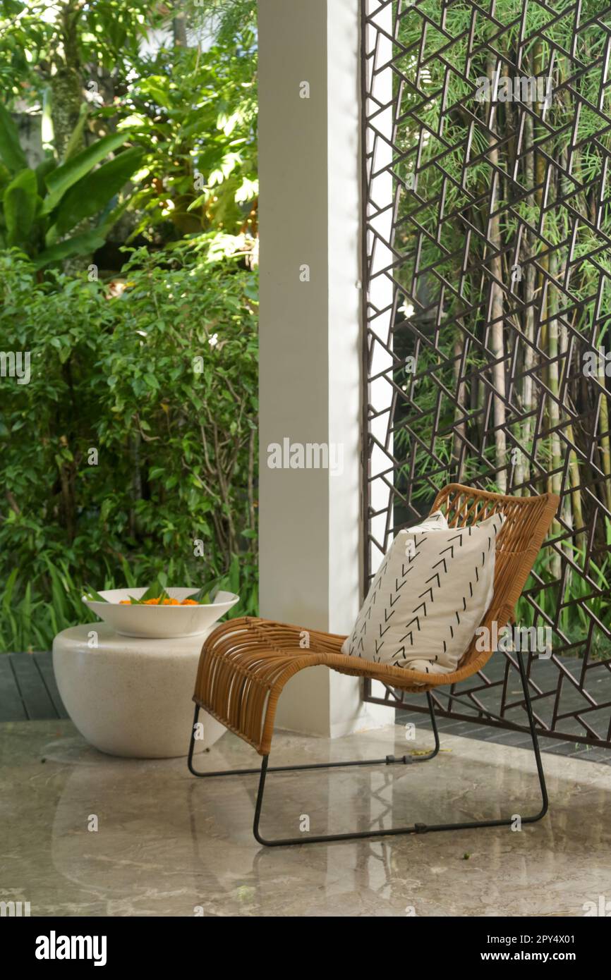 Half opened lounge area with all natural materials made furniture ...