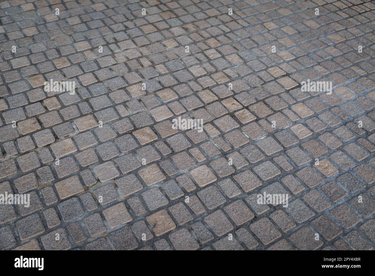 Cobblestone pavement texture background Stock Photo - Alamy