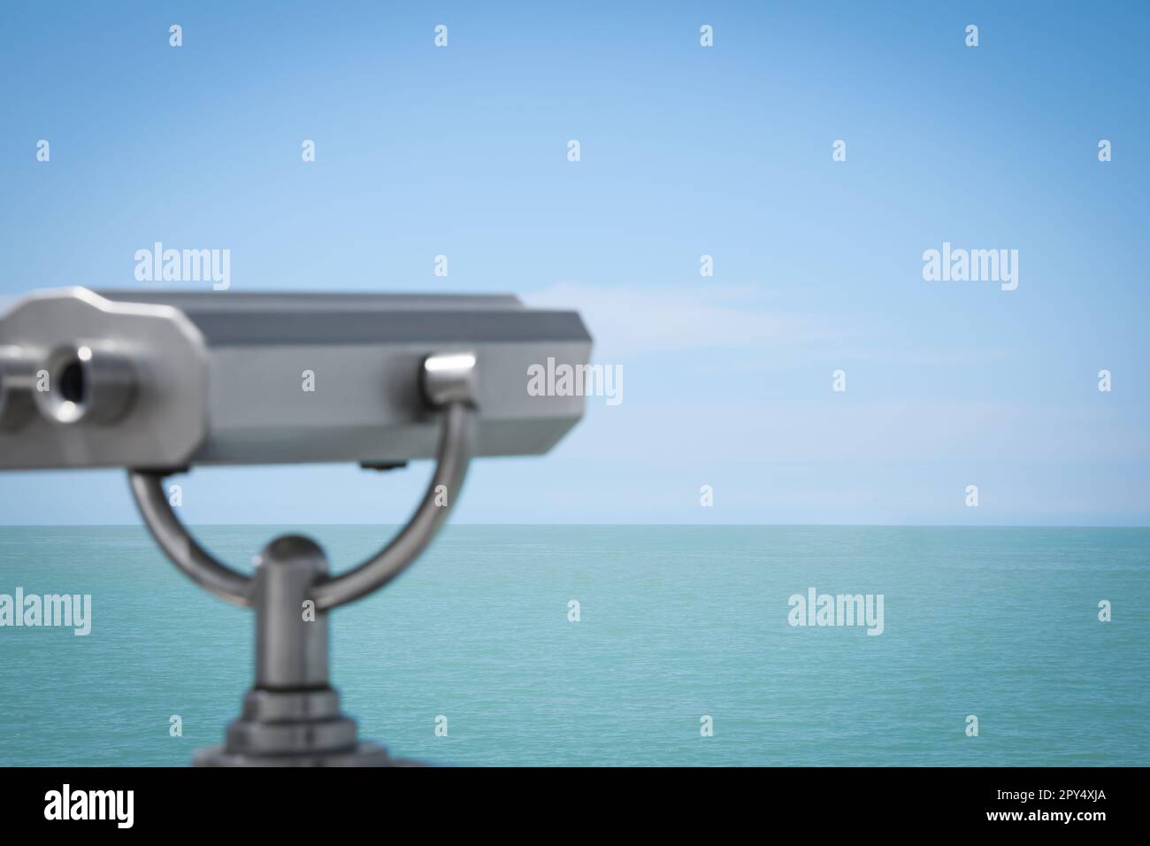 Metal tower viewer and picturesque view of sea with boat. Mounted ...