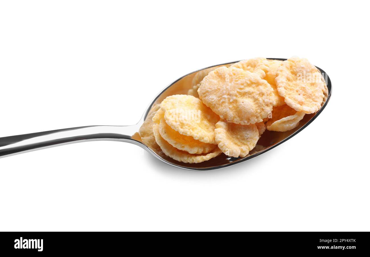 Metal spoon of tasty crispy corn flakes on white background Stock Photo ...