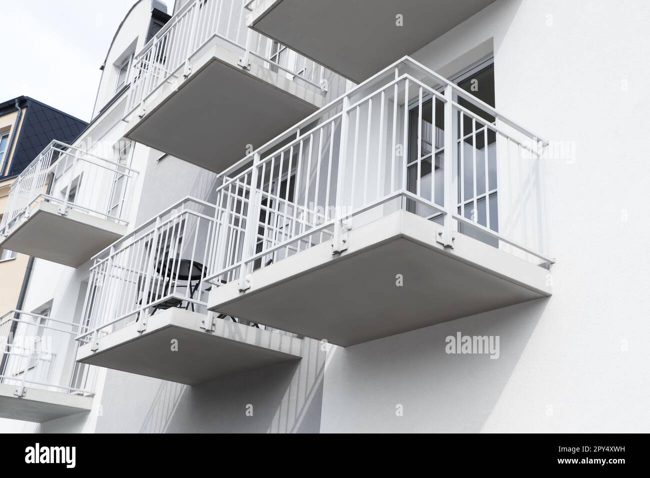 Exterior of beautiful building with empty balconies Stock Photo - Alamy