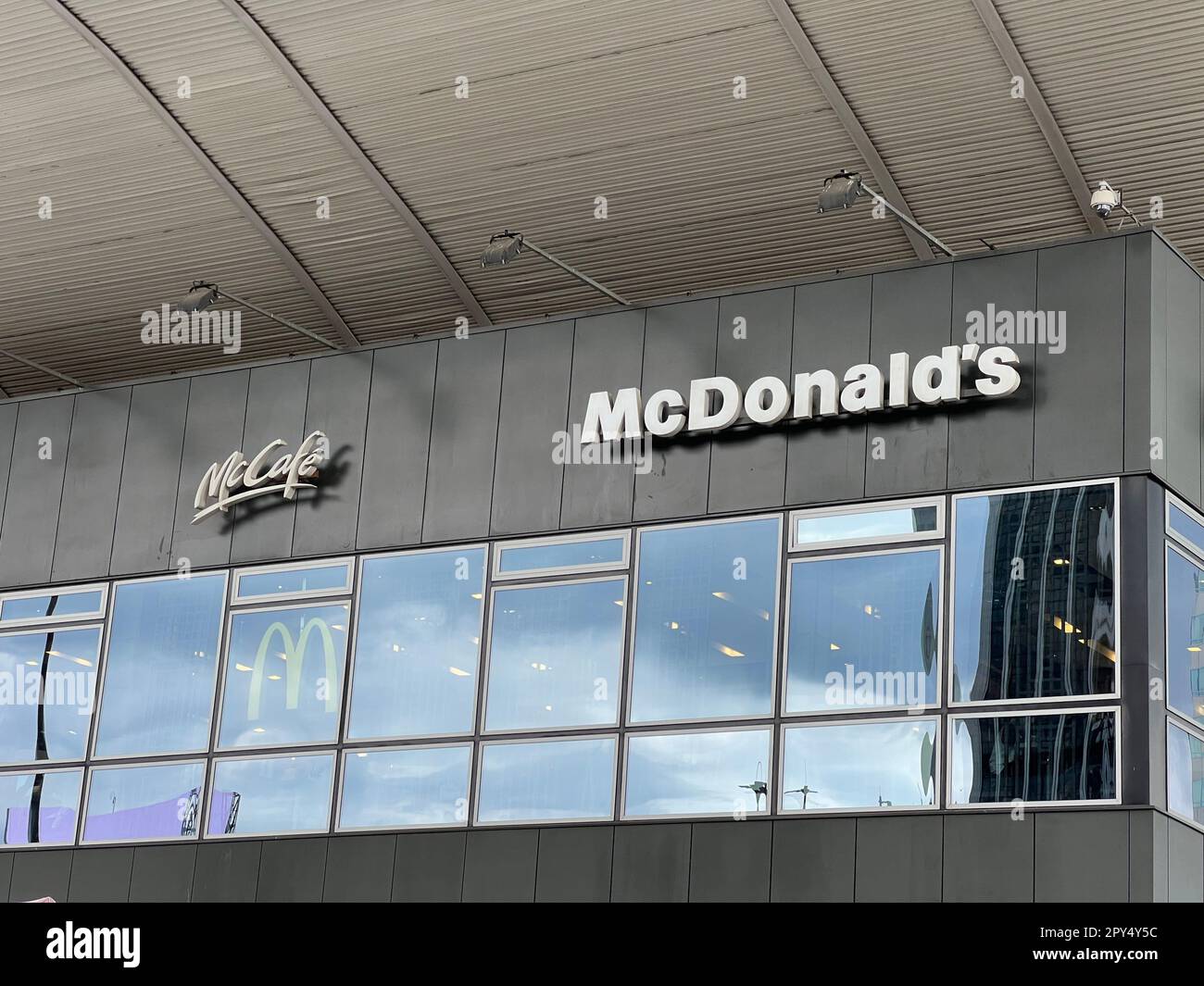 WARSAW, POLAND - JULY 17, 2022: Shopping mall with McCafe and McDonald ...