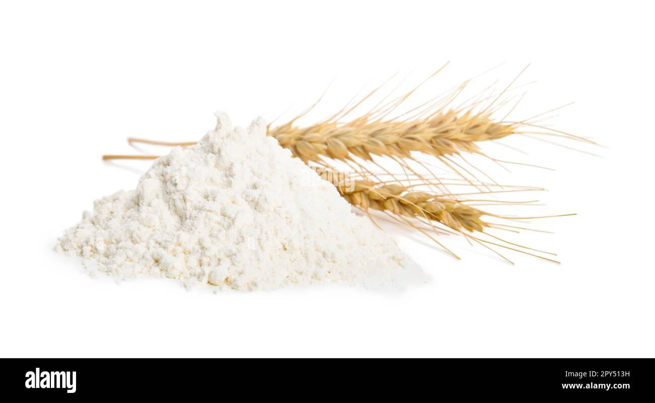 Pile of wheat flour and spikes isolated on white Stock Photo - Alamy
