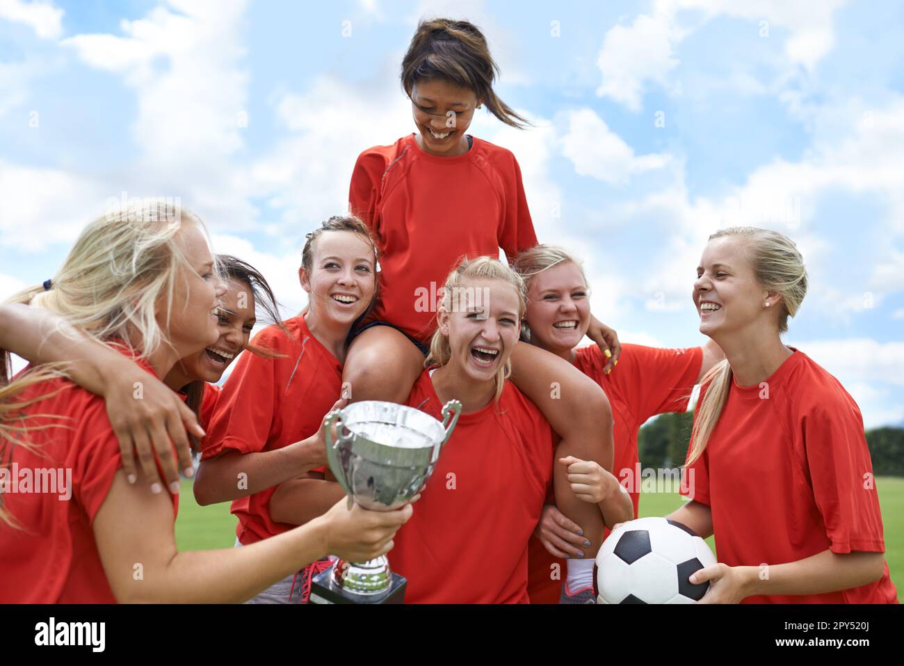 Sports, trophy and women soccer team winner celebrating victory ...
