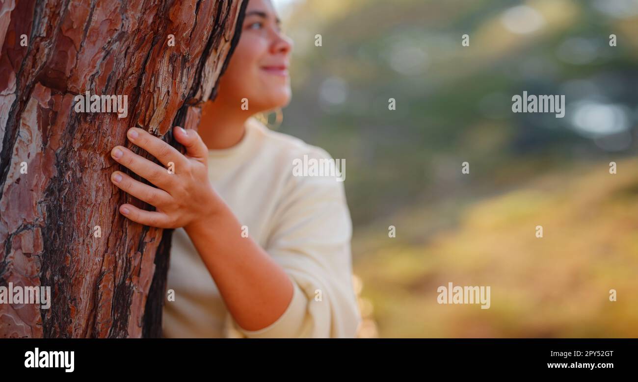 woman love nature hugging pine tree, no deforestation concept and earth ...