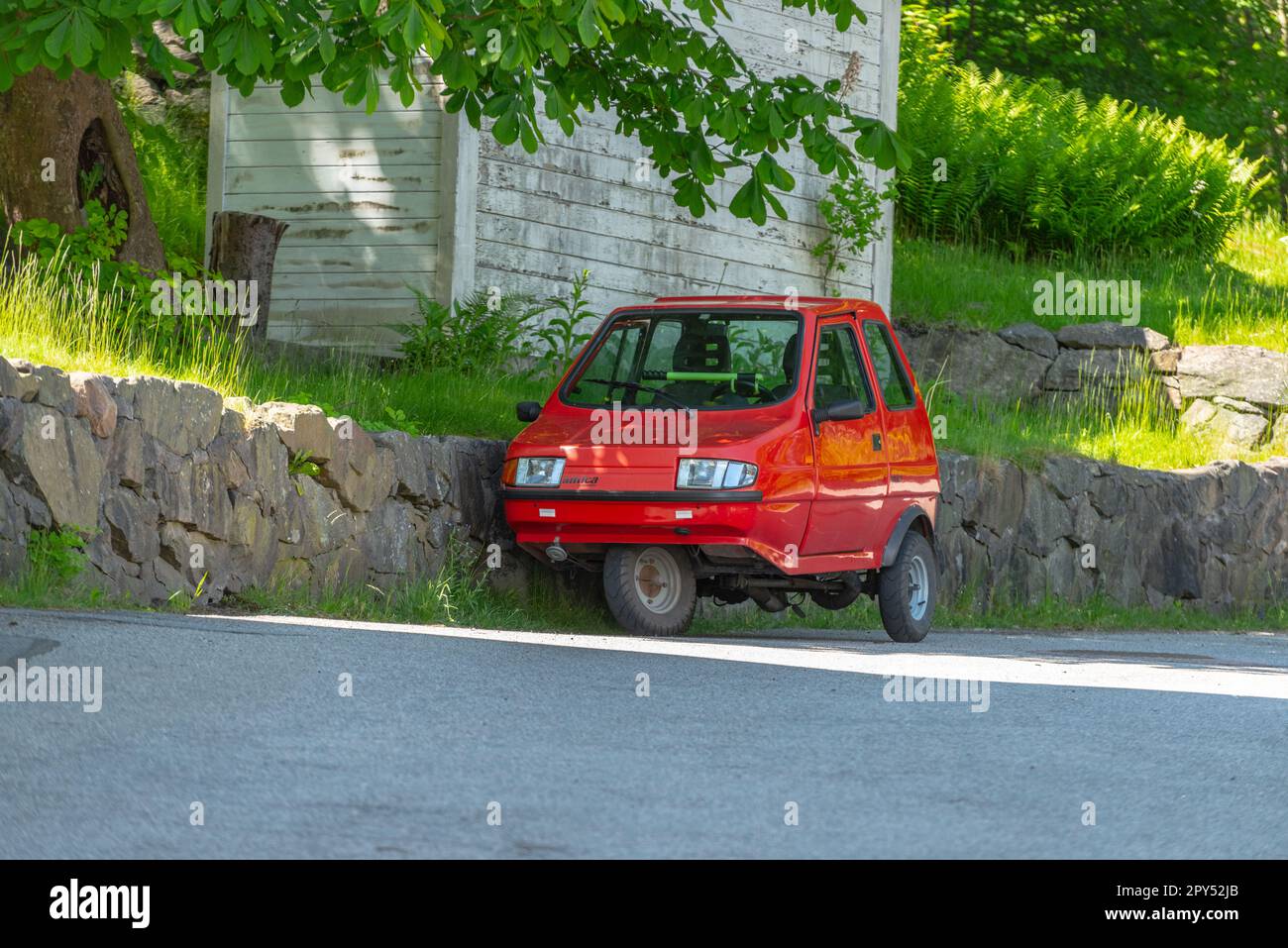 Gothenburg, Sweden - May 29 2022: Red Amica three wheeled micro car ...