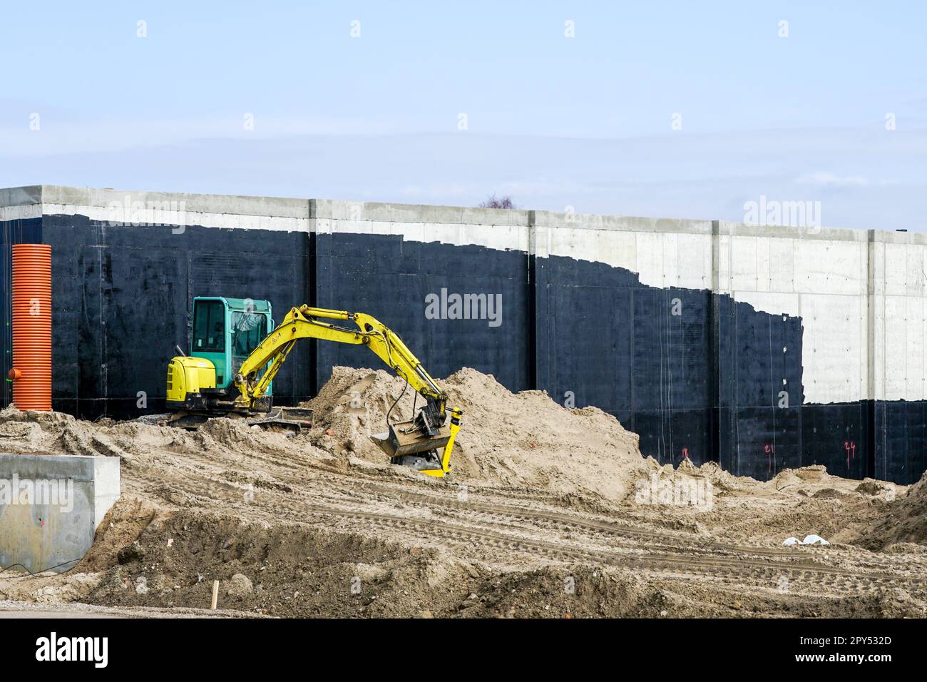 Concrete wall of a huge water reservoir built using concrete formwork ...