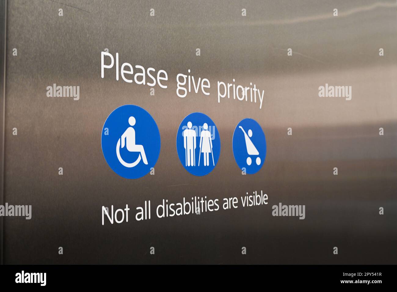 Please give priority sign stating not all disabilities are visible, on ...