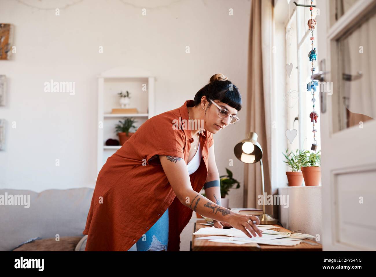 Planning her next eye-catching sketch. a an artist looking at her ...