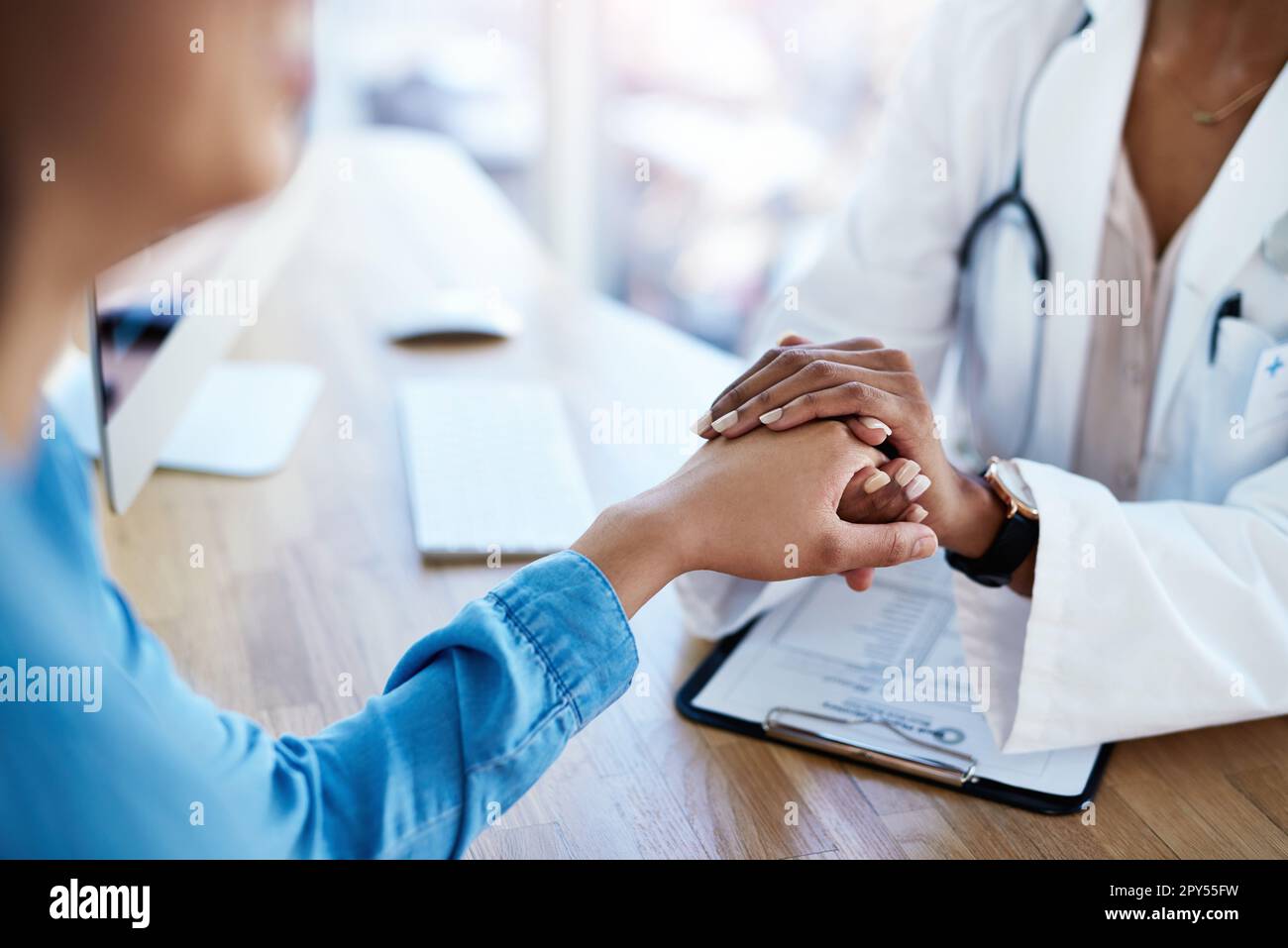 Compassion is the biggest part of healthcare. a doctor holding hands ...