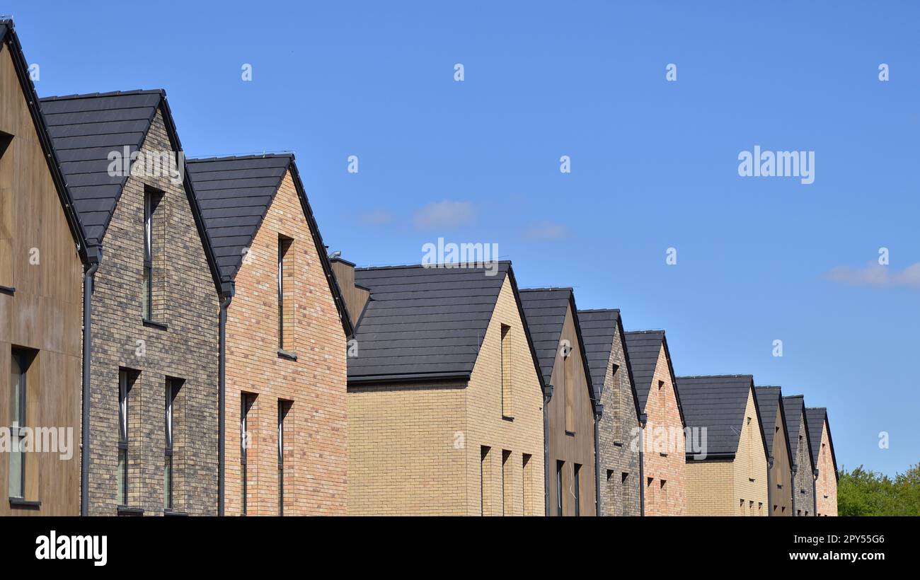 Terraced family homes in newly developed housing estate. The real ...