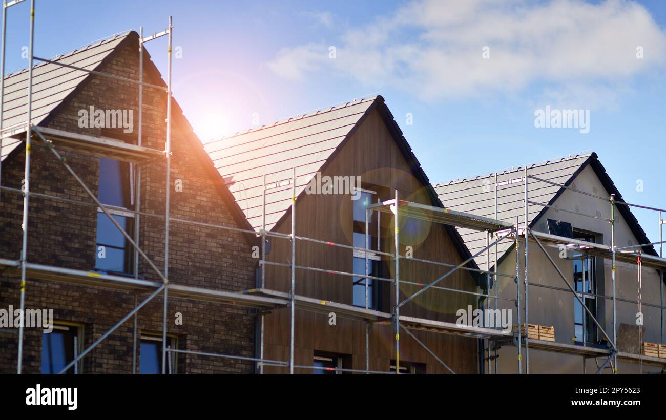 Terraced houses under construction. Housing estate development under ...