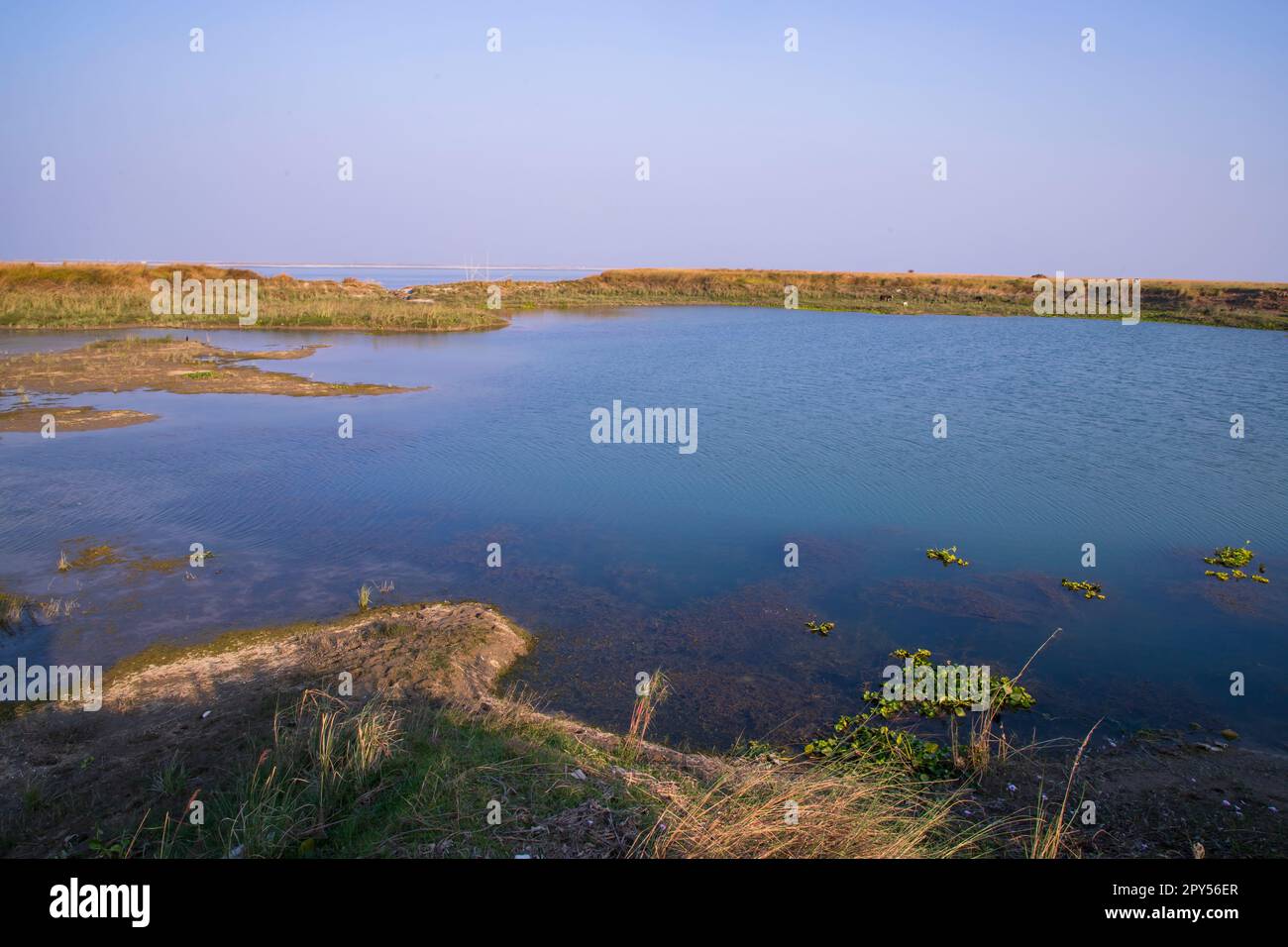 Crystal clear blue water lake landscape view nearby Padma river in ...