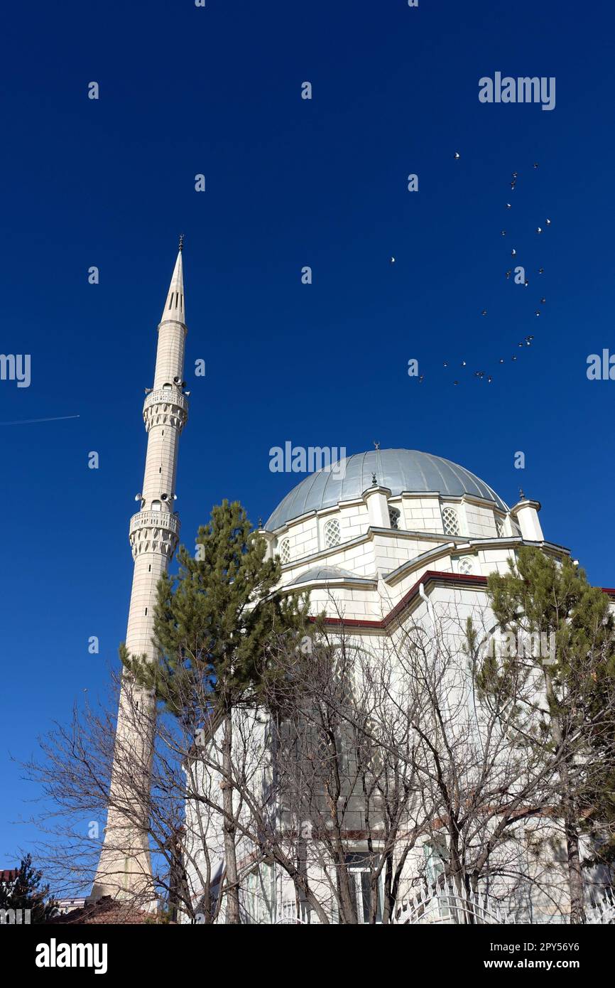 blue sky and a mosque with a minaret, examples of islam and mosque ...