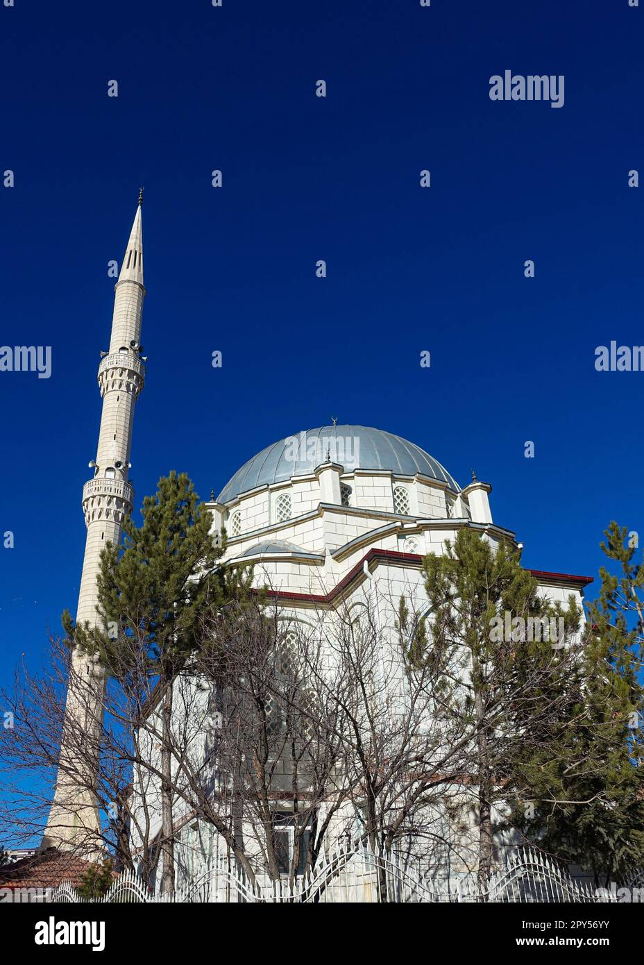 blue sky and a mosque with a minaret, examples of islam and mosque ...
