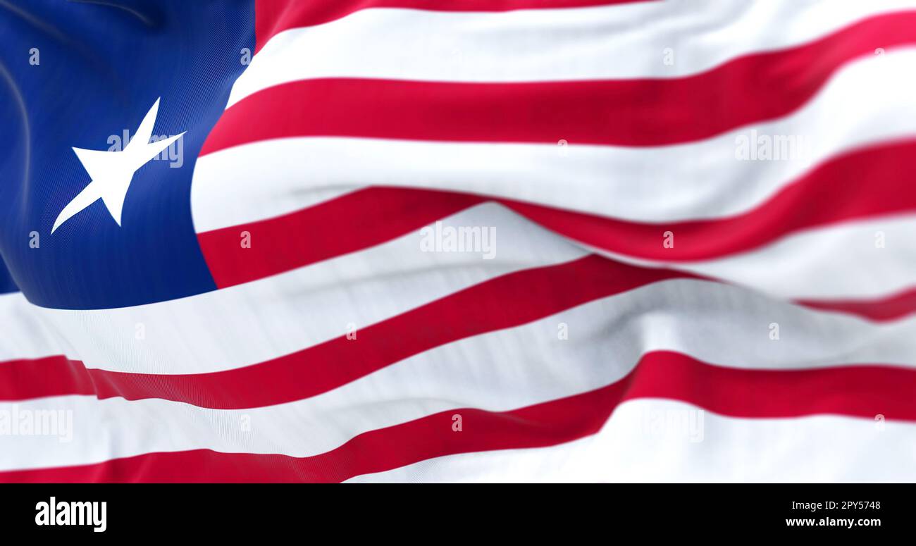 Detail of Liberia National flag waving. The Republic of Liberia is a ...