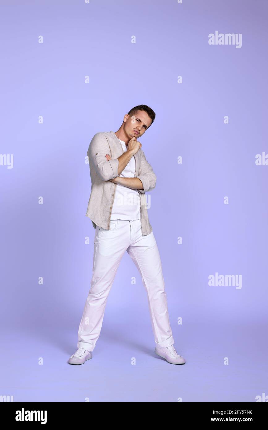 Handsome thinking male model hi-res stock photography and images - Alamy