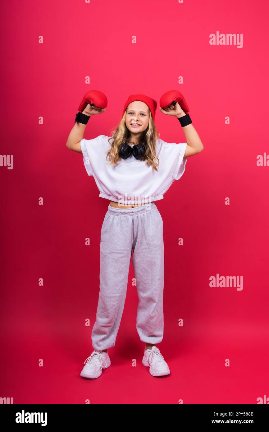 Little girl wearing red boxing gloves, studio shot, sport concept Stock ...
