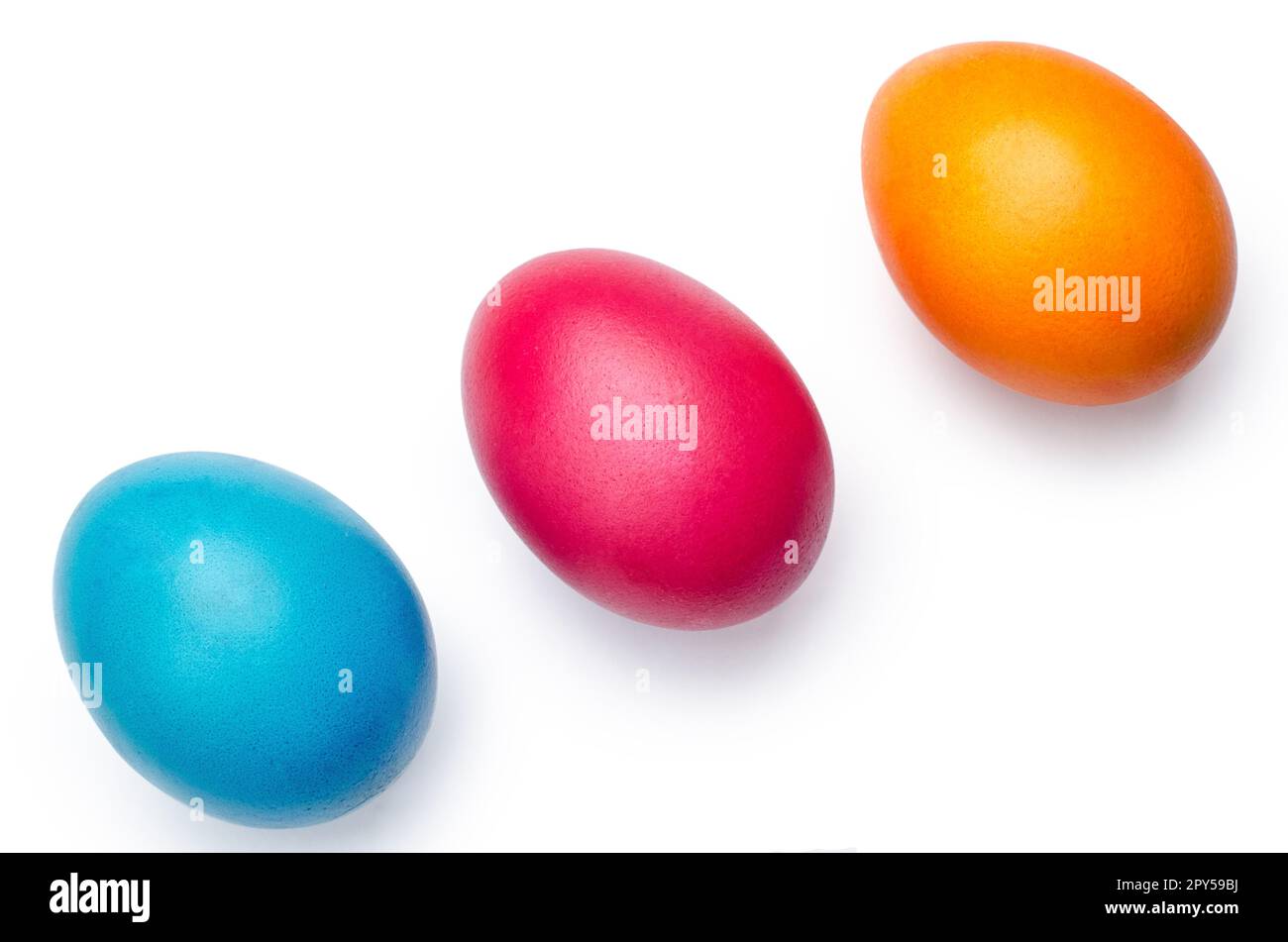 three colored eggs, isolated on white backgroung Stock Photo - Alamy