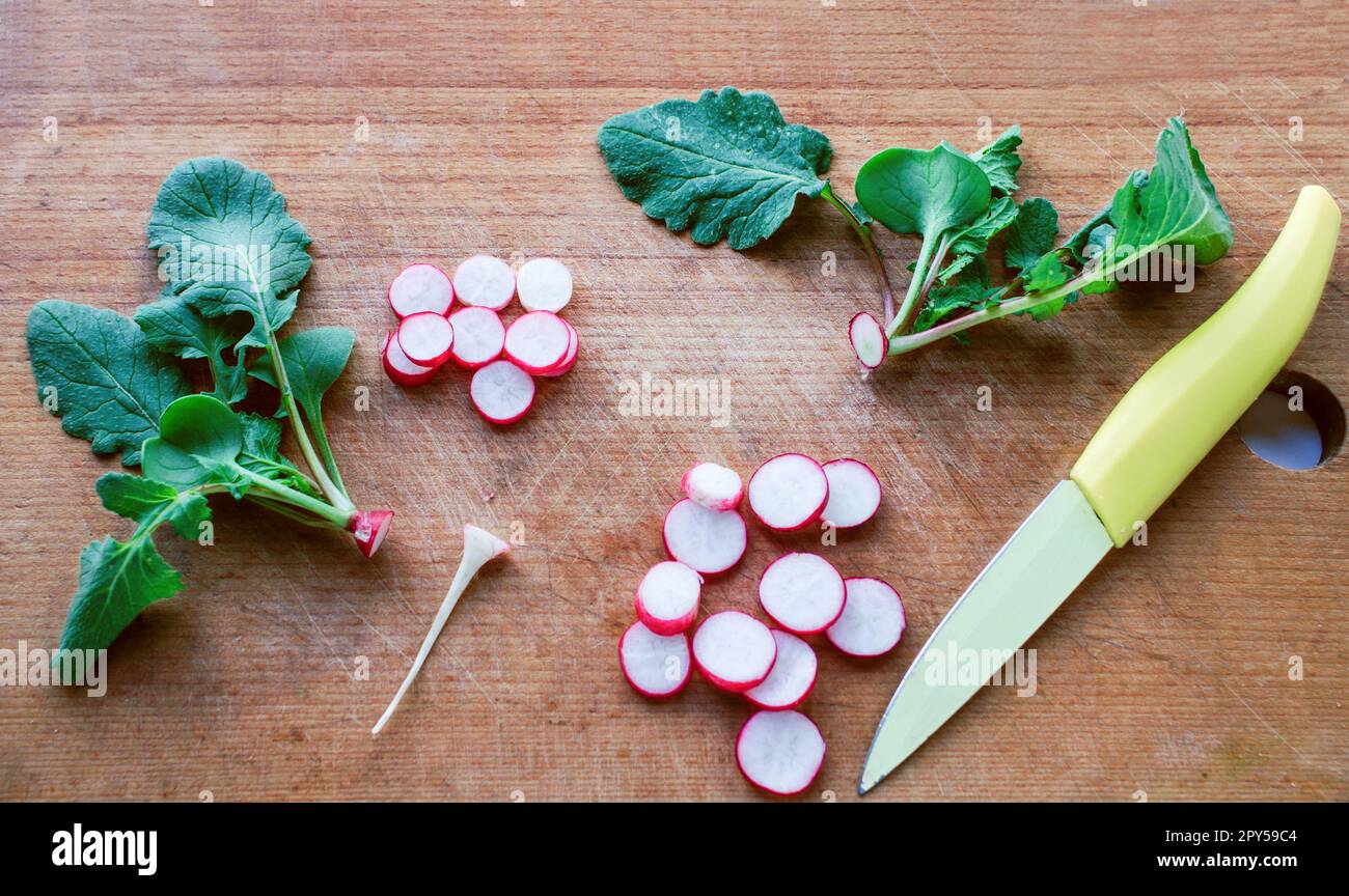 Board with radish hi-res stock photography and images - Alamy