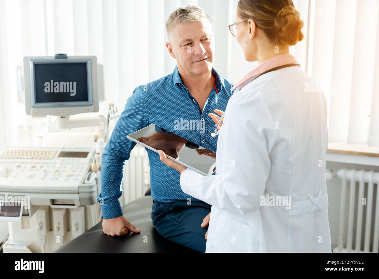 Doctor woman explaining patient test results after examination Stock ...