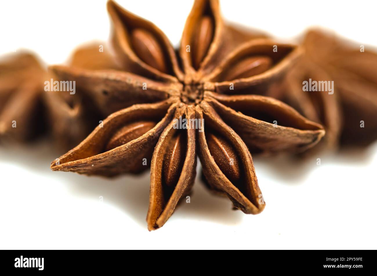 Illicium verum, Stars of dried anise isolated on white background ...