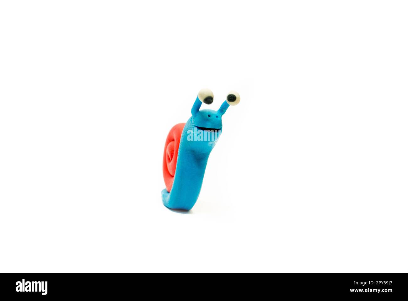 Plasticine colored snails isolated on white background Stock Photo - Alamy