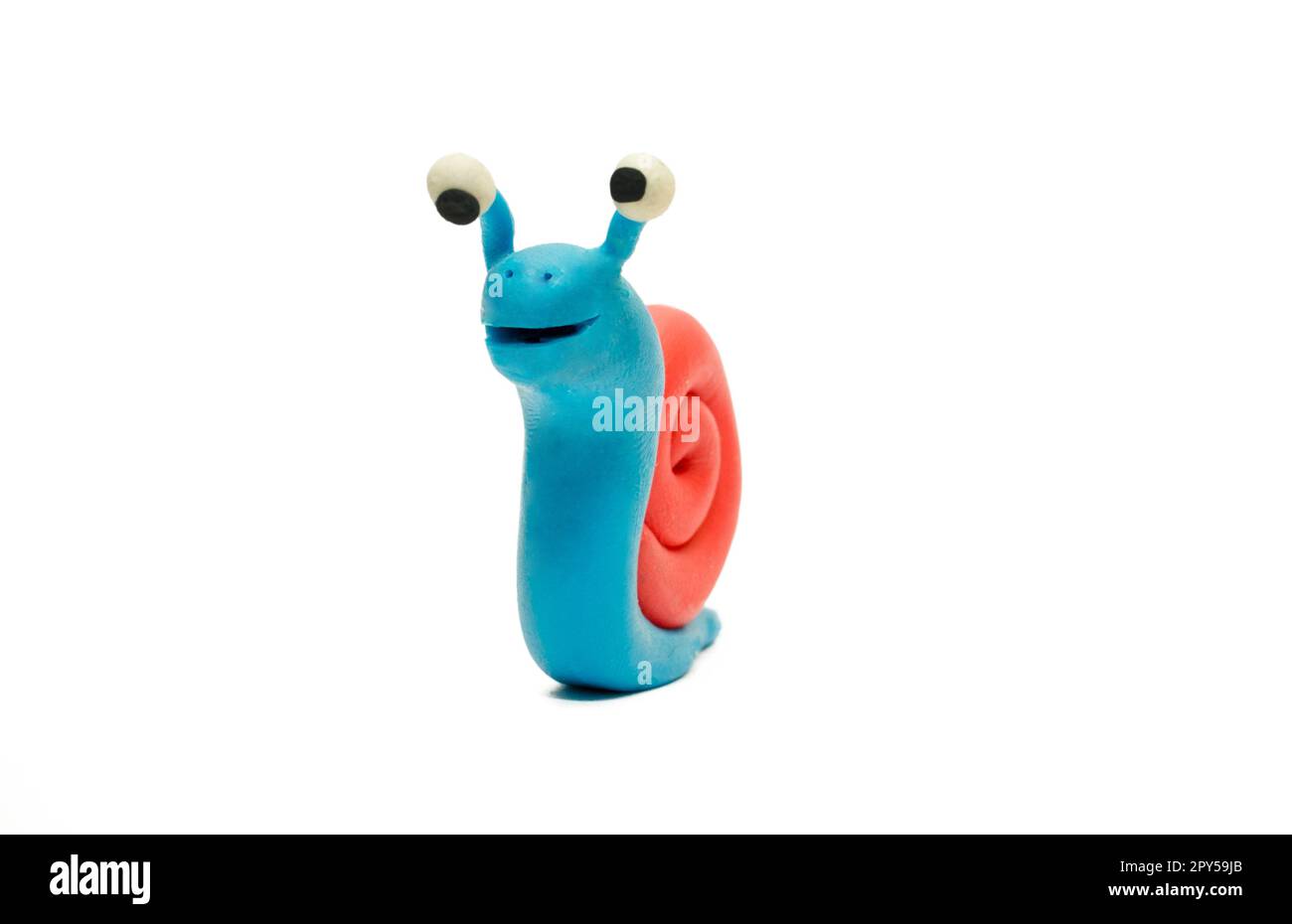 Plasticine colored snails isolated on white background Stock Photo - Alamy